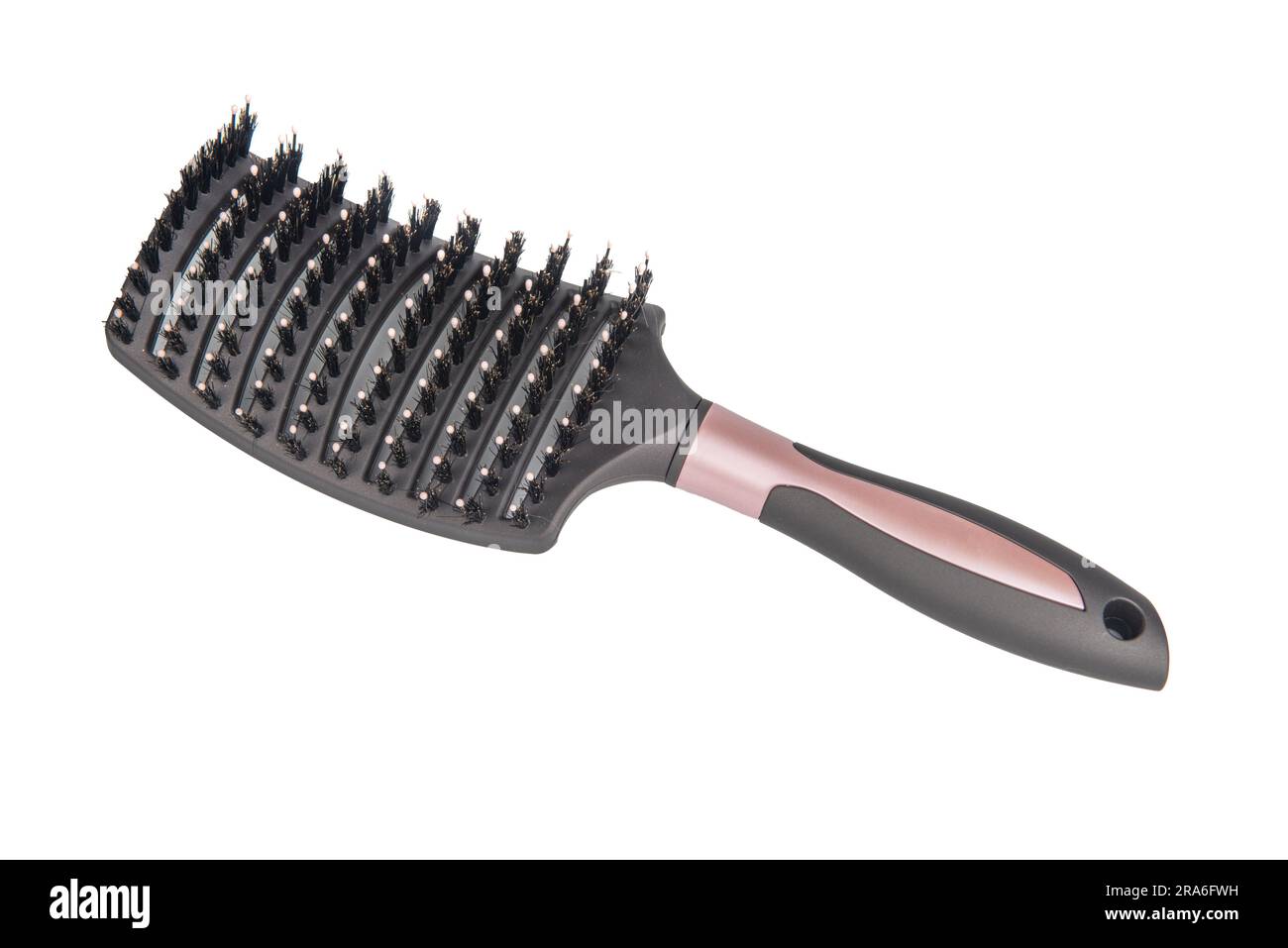 A bristled pink hair brush against a white background Stock Photo - Alamy