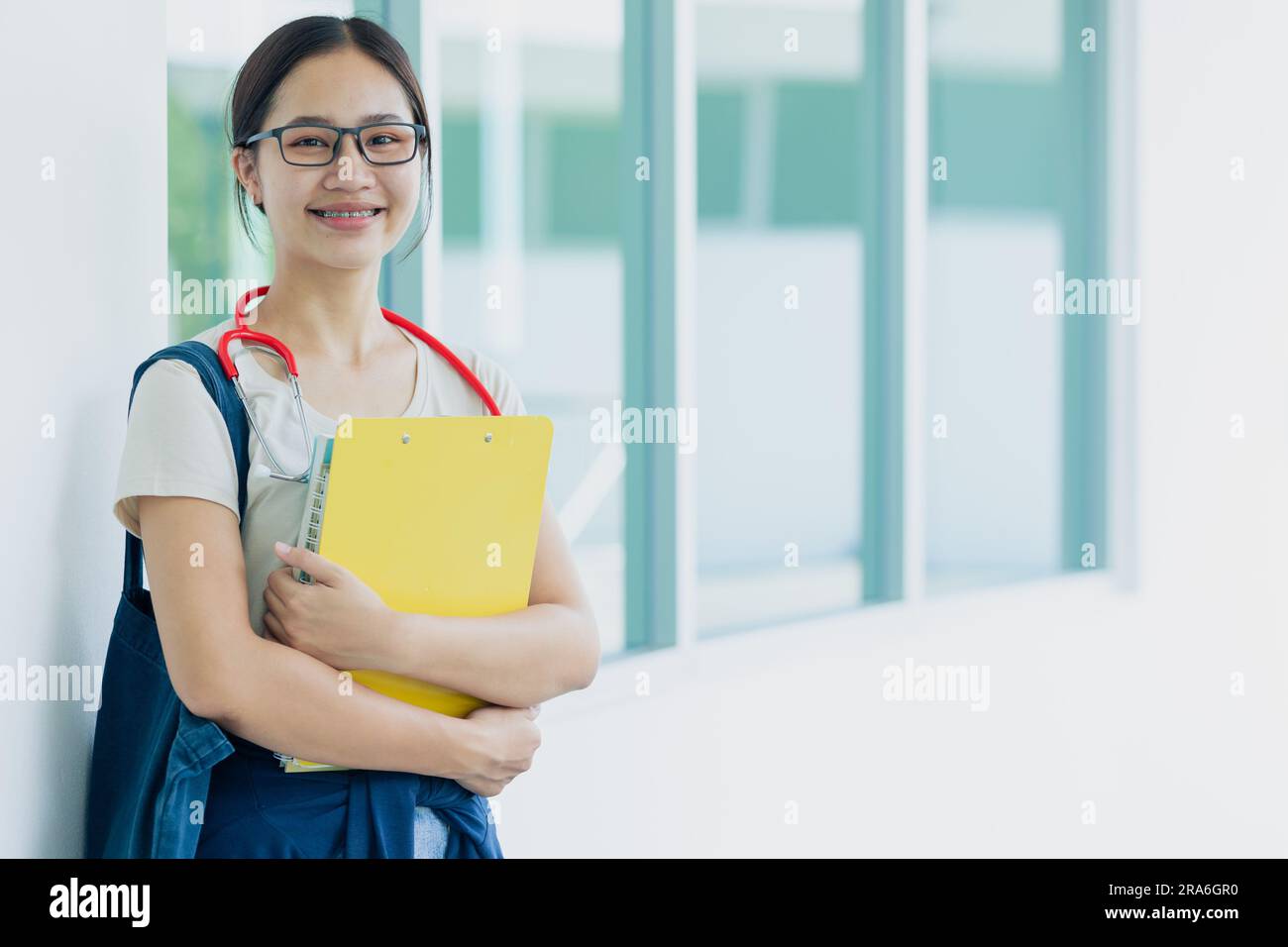 Happy doctor medical university teen girl student in school campus enjoy study education Asian ...