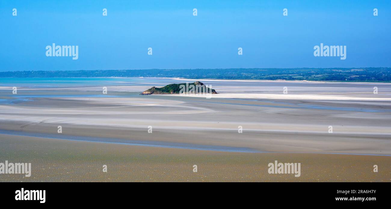 landscape with the island Tombelaine in the bay of Mont Saint-Michel in ...