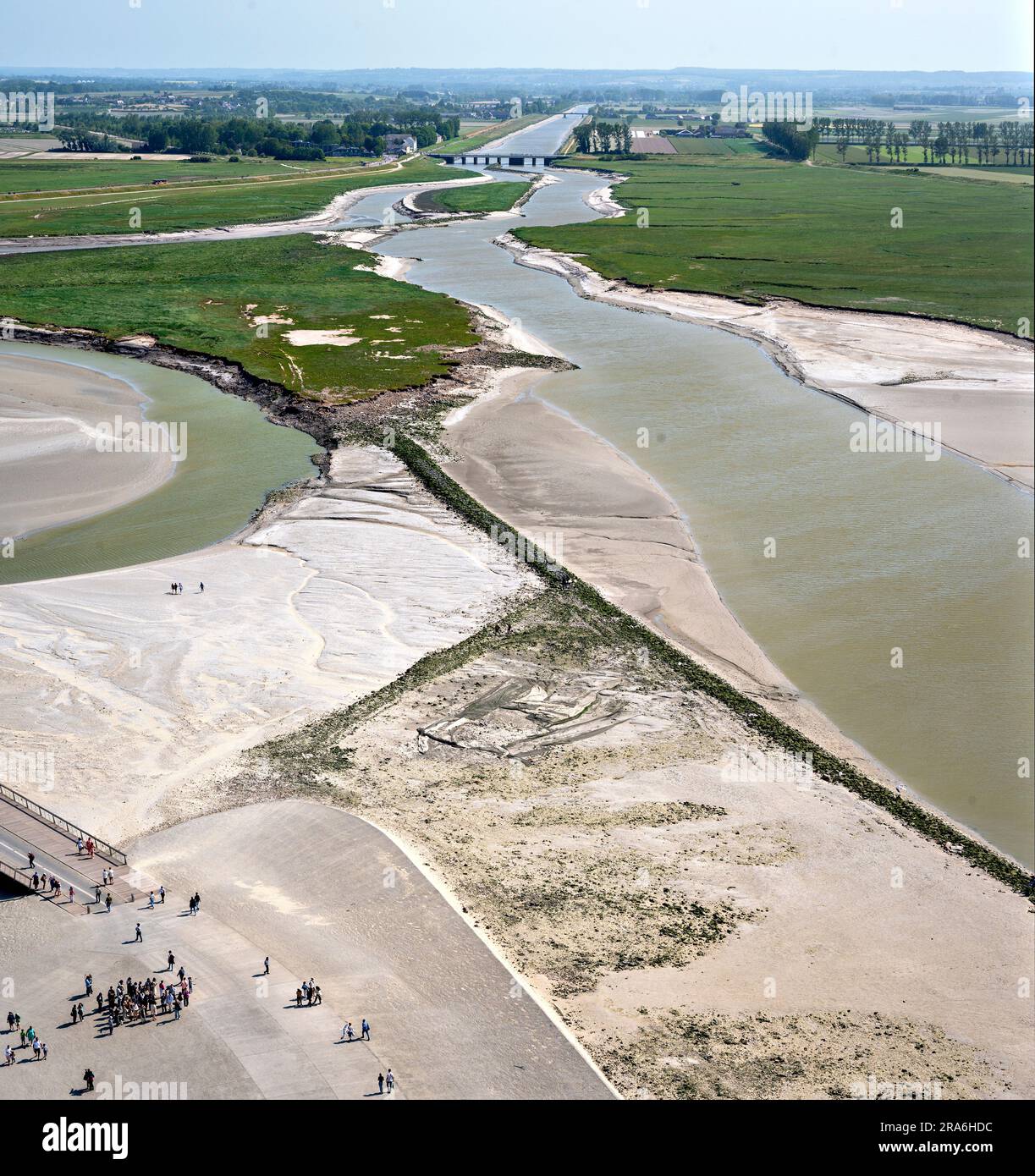 view from the Mont Saint-Michel onto the outlet of the river Cuesnon ...
