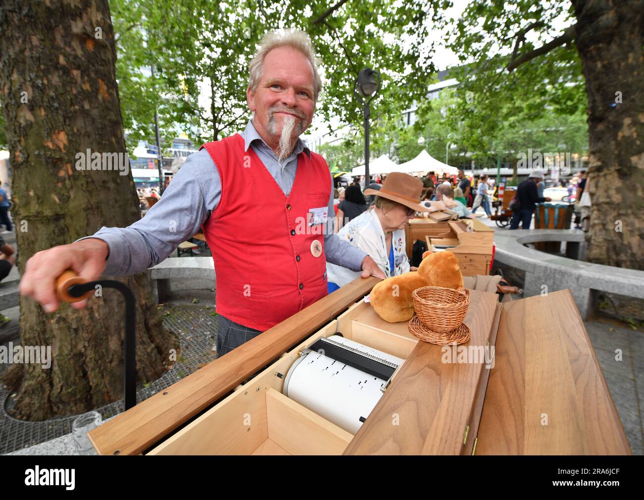 Berlin, Germany. 1st July, 2023. A barrel organ player performs during ...