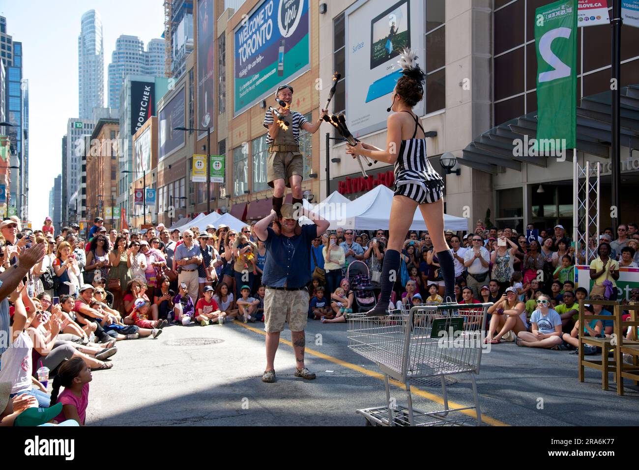 Toronto, Ontario / Canada - Aug 24, 2014: Jugglers in a street festival ...