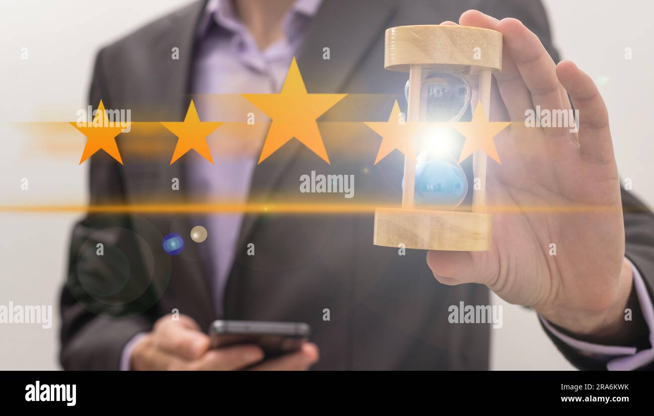 The person's hand pointing at hovering stars. Rating, evaluation Stock ...