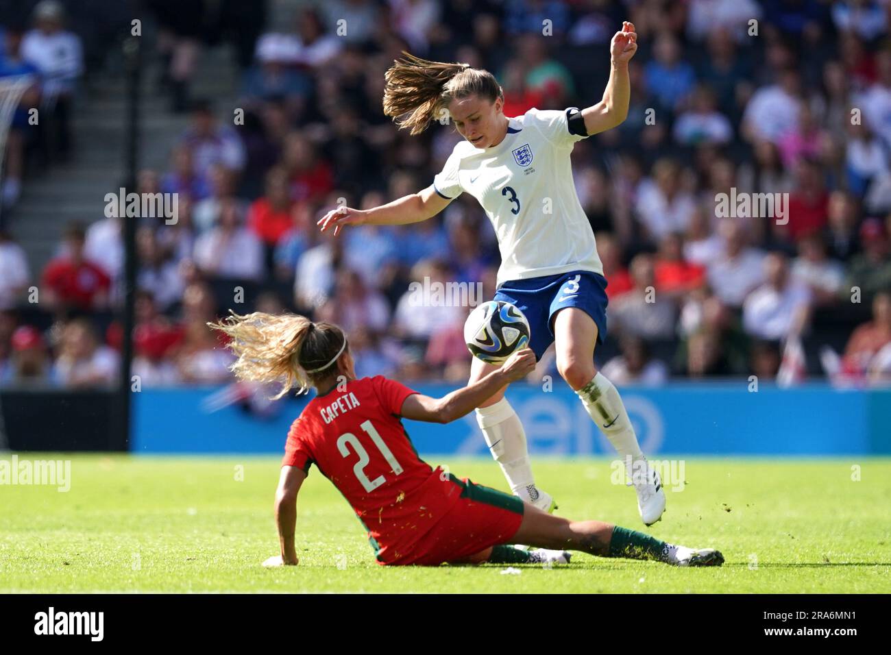 England's Niamh Charles (right) and Portugal's Ana Capeta battle for ...