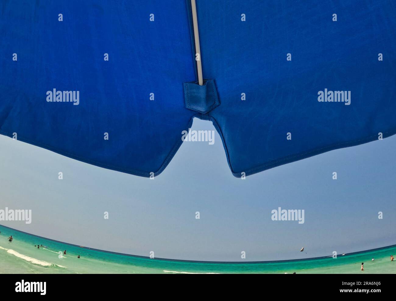 The view from under the beach umbrella Stock Photo - Alamy