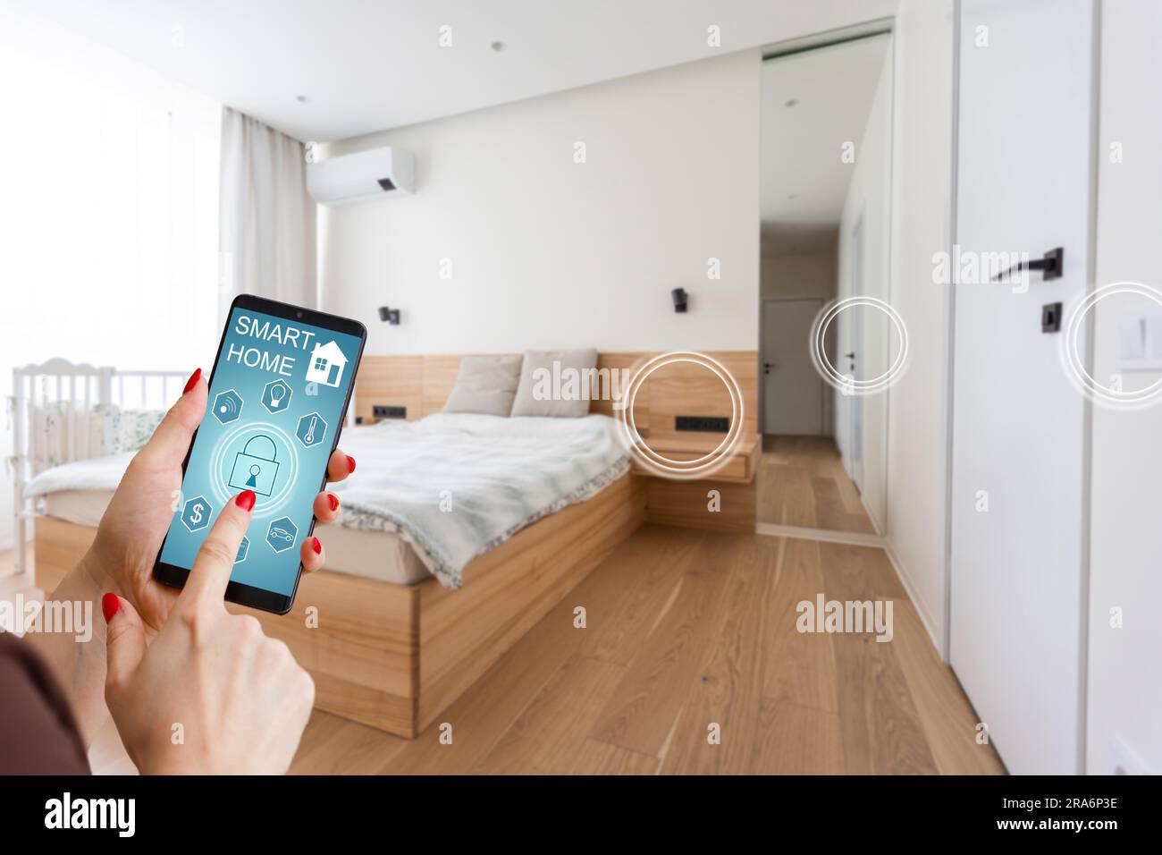 Smart home technology interface on smartphone app screen with augmented ...