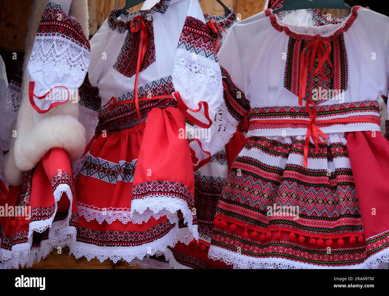 Cute traditional costumes for kids sold for tourists in Romania Stock ...