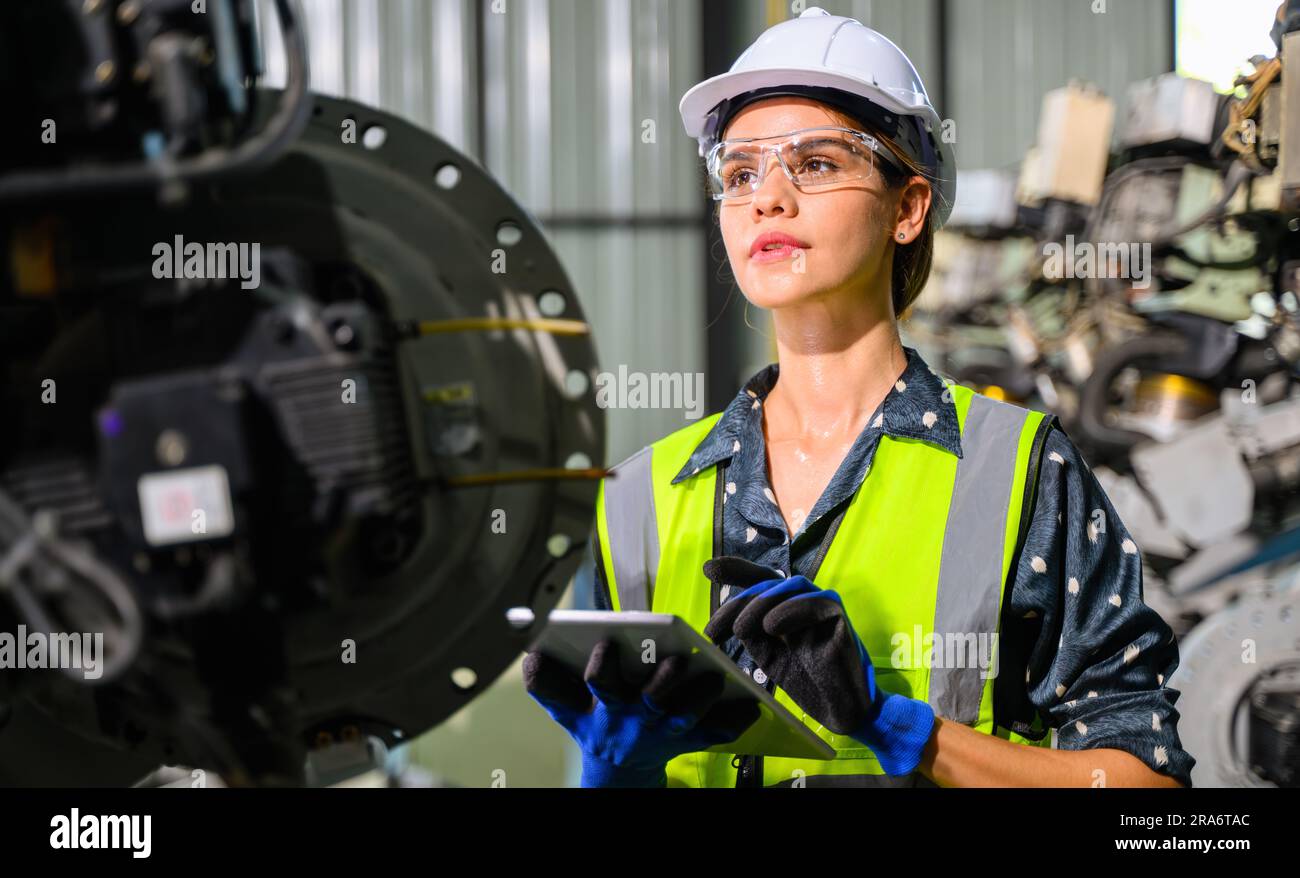 Factory worker managing industrial machine hi-res stock photography and ...