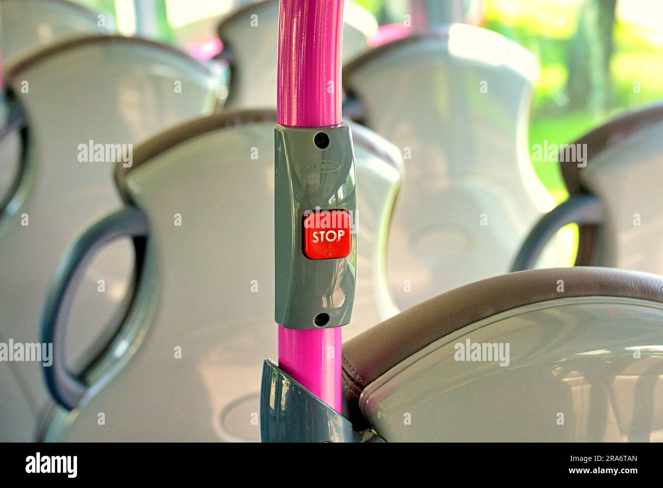 empty first bus seats red press switch Stock Photo - Alamy
