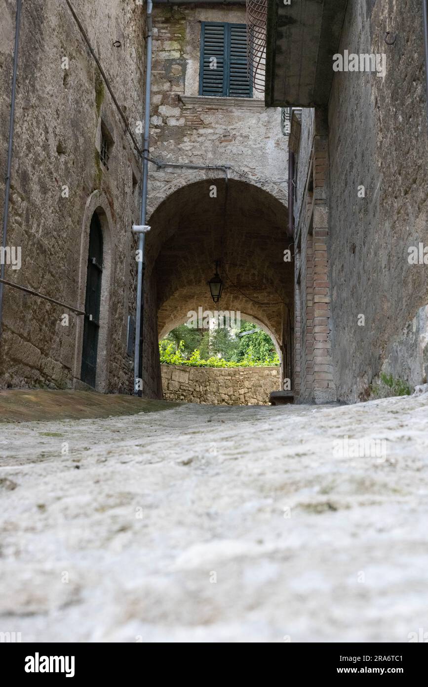 Old street in Italy made up of pebbles Stock Photo - Alamy