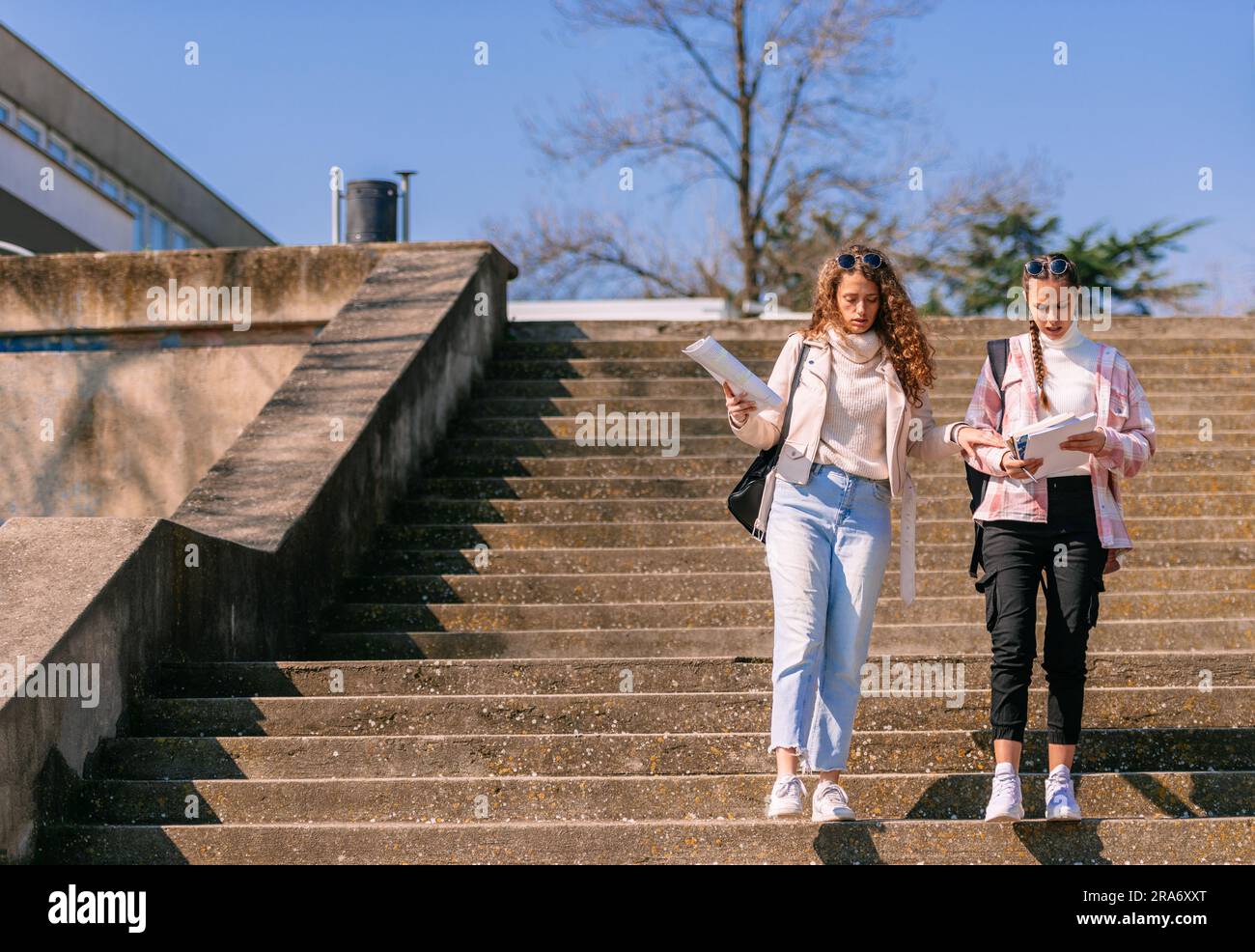 School girls on stairs hi-res stock photography and images - Alamy