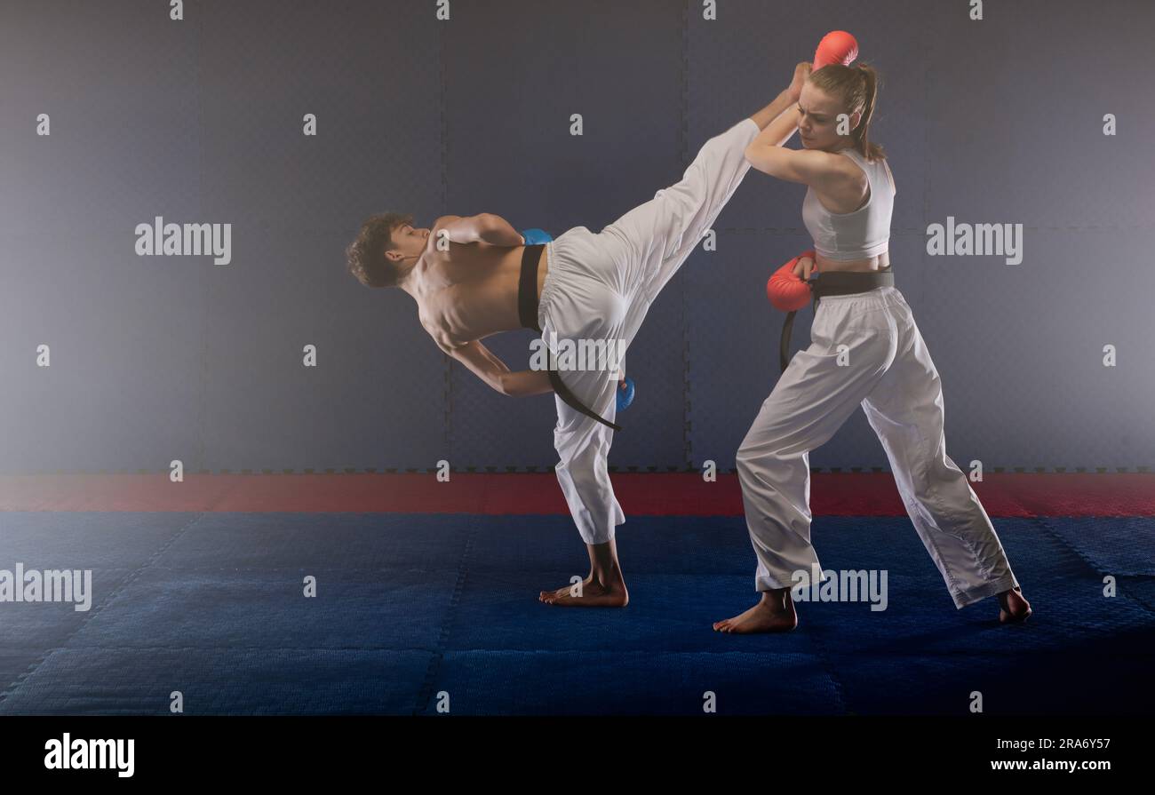 Young karate Friends doing the Mawashi Geri practice at the karate club ...