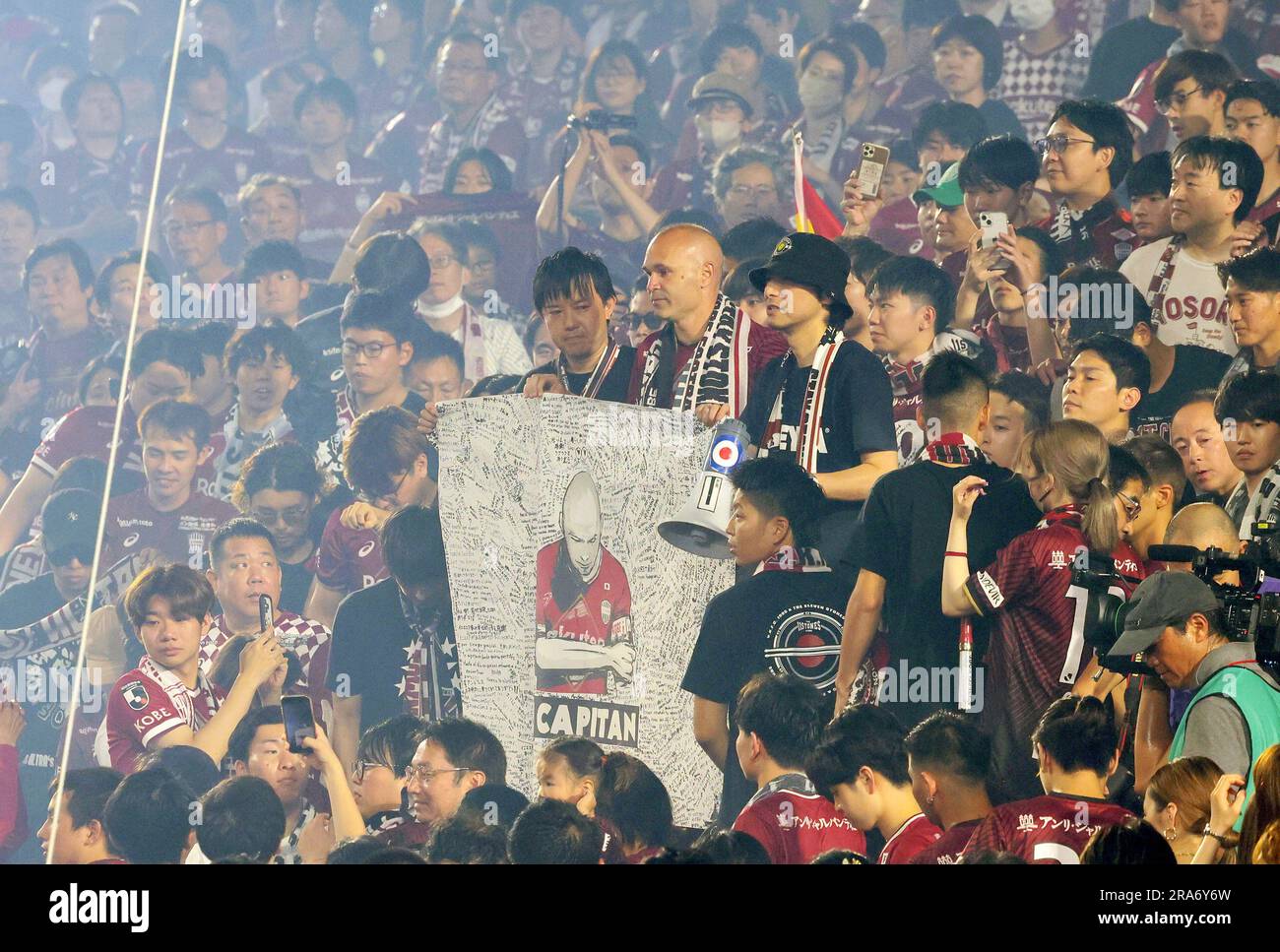 Spanish Andres Iniesta of Vissel Kobe poses with supporters and fans ...