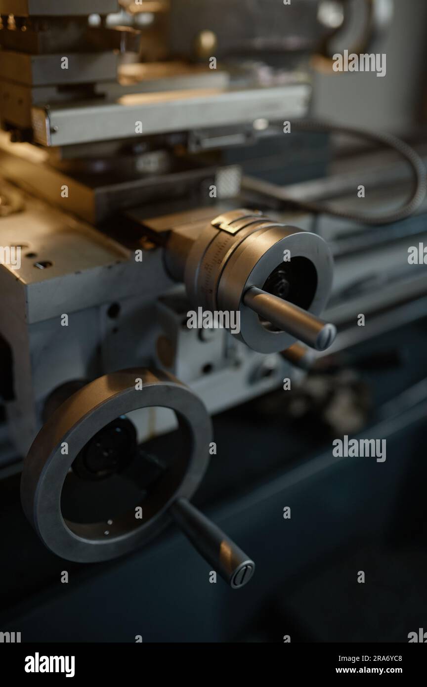 Professional lathe turning machine at garage workshop Stock Photo - Alamy