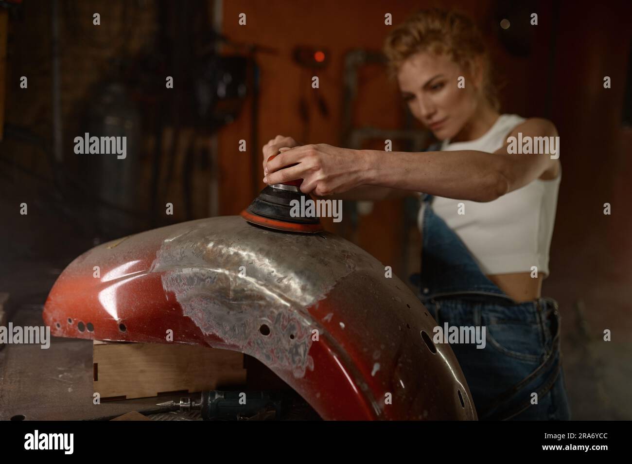 Motorcycle repair woman hi-res stock photography and images - Alamy