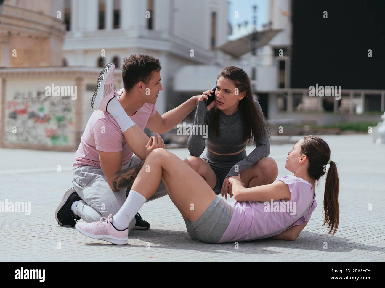 Friends calling ambulance hi-res stock photography and images - Alamy