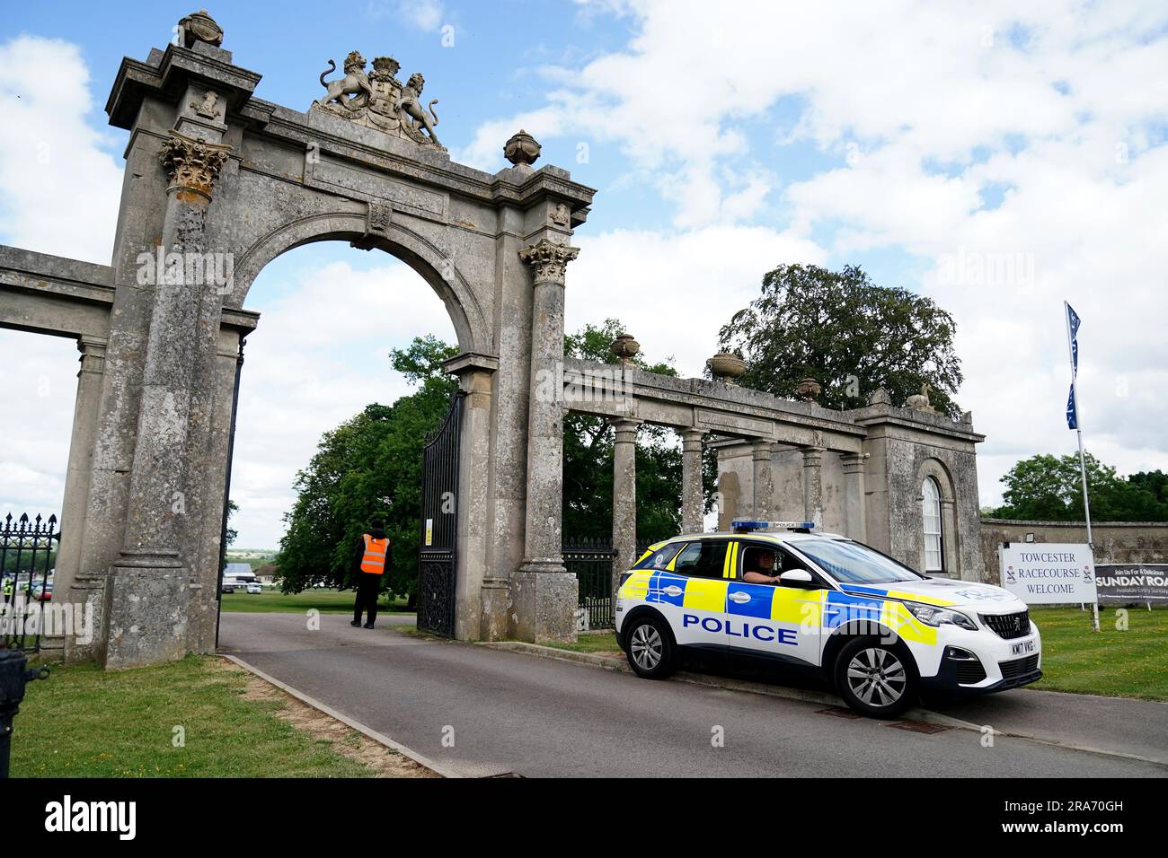 The police can be seen outside of Towcester Racecourse during The ...