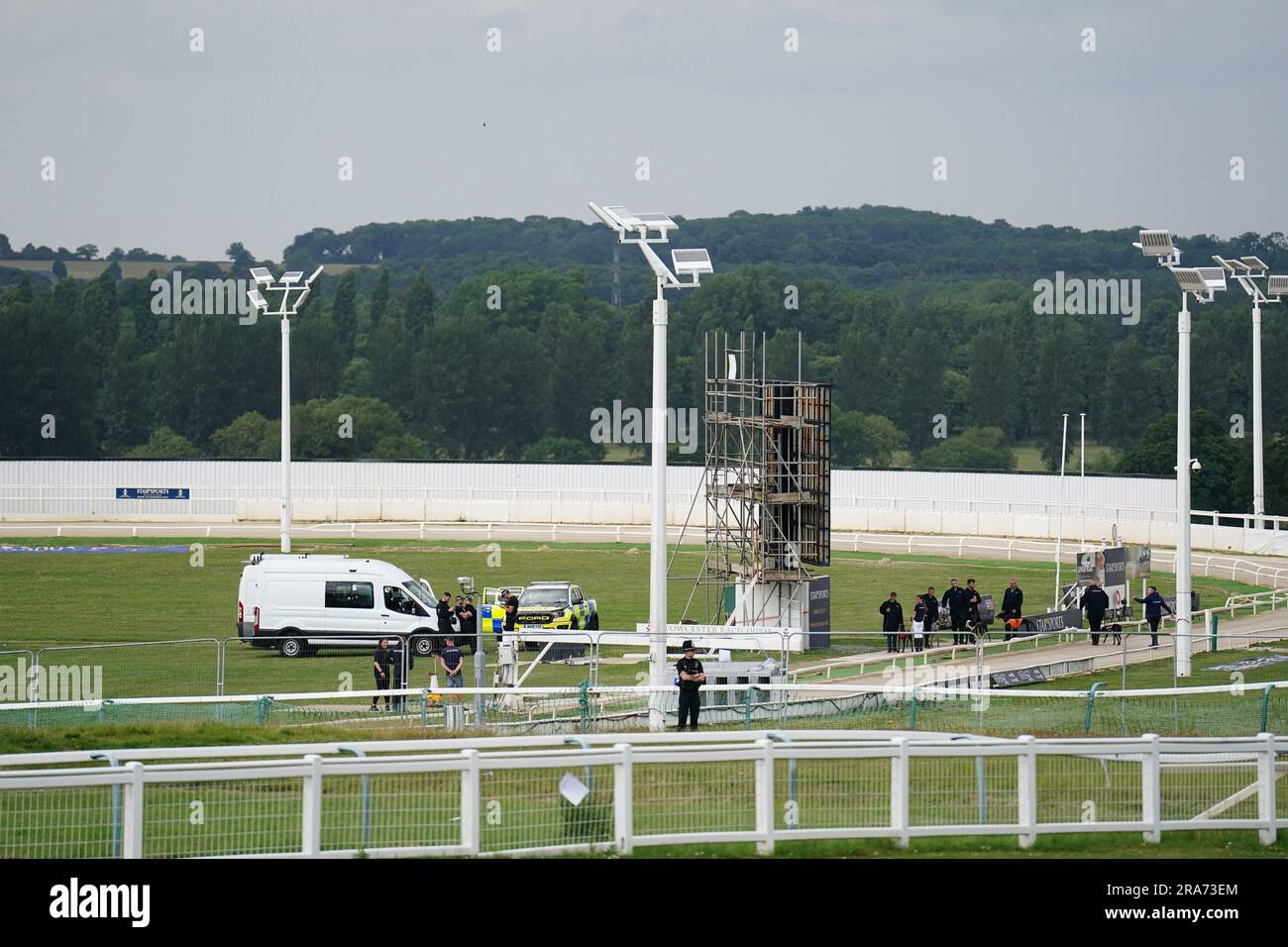 Police can be seen inside of the racecourse during The English ...