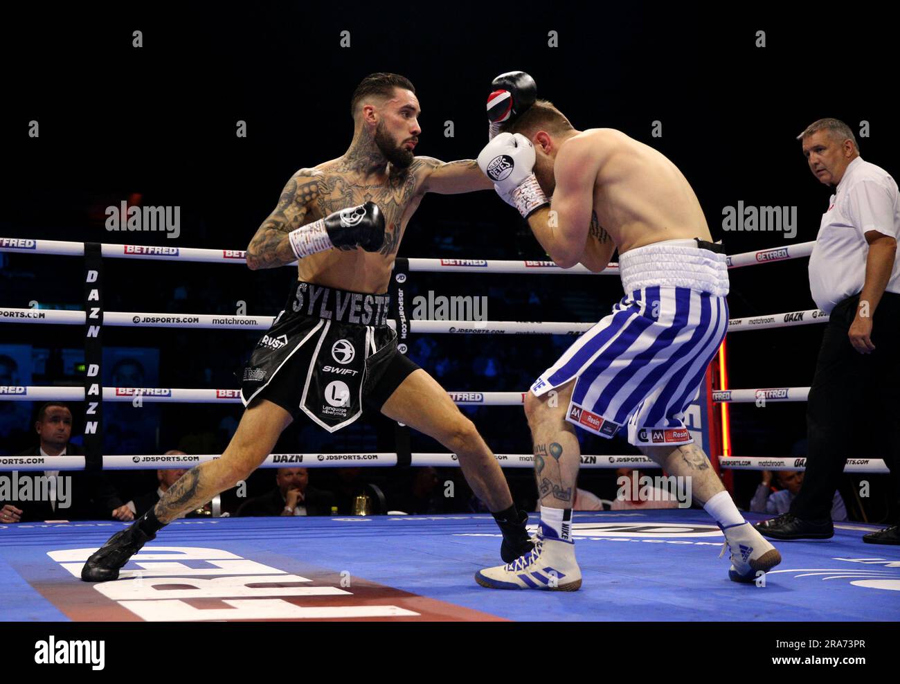 Lewis Sylvester (left) and Adam Cope in action during their English ...