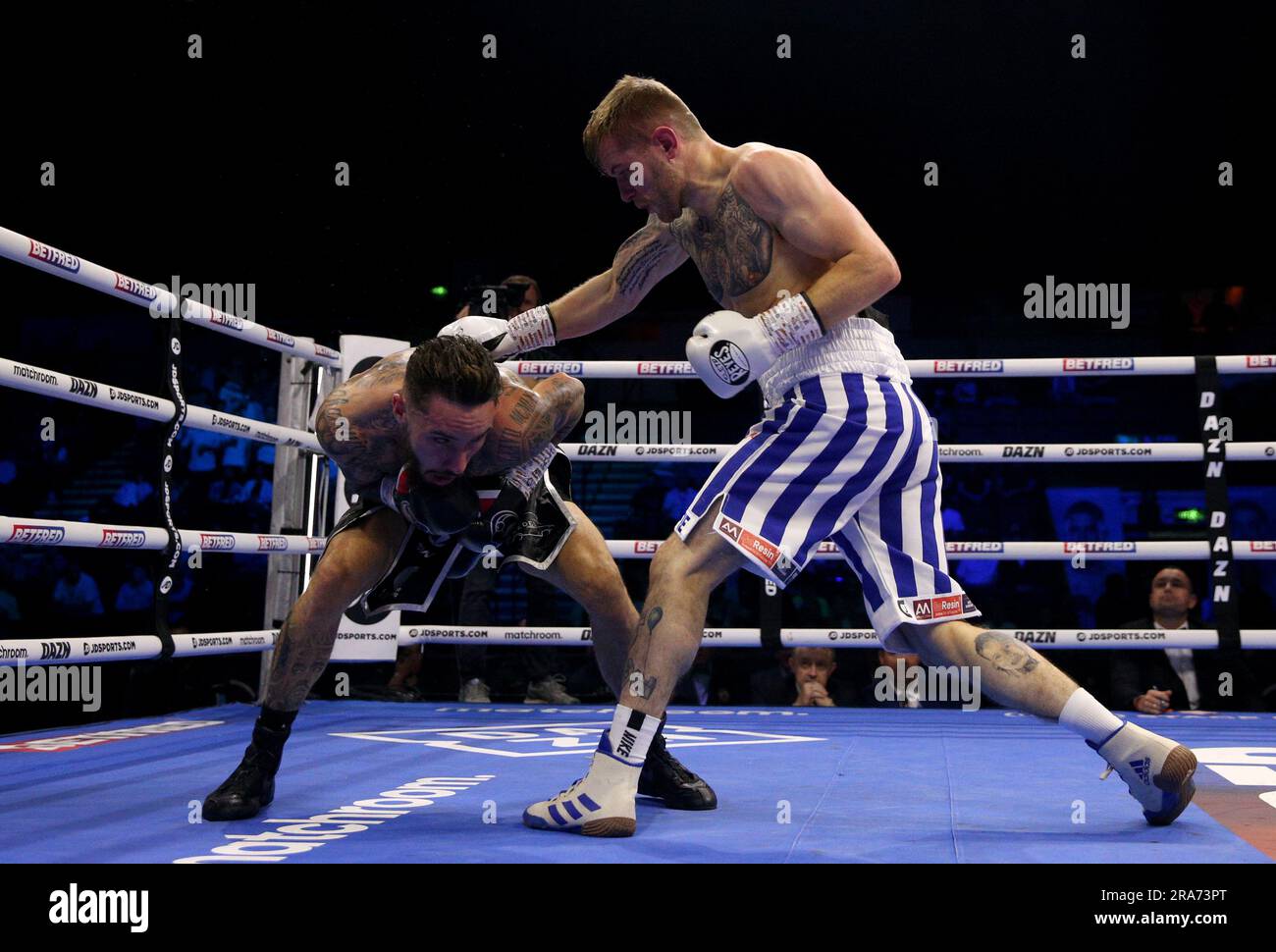 Lewis Sylvester (left) and Adam Cope in action during their English ...