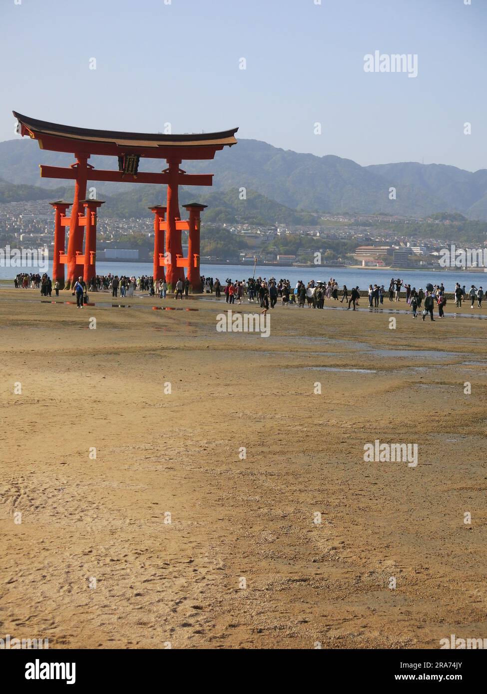 The 16.6m tall red Torii Gate on the beach at Miyajima Island dominates ...