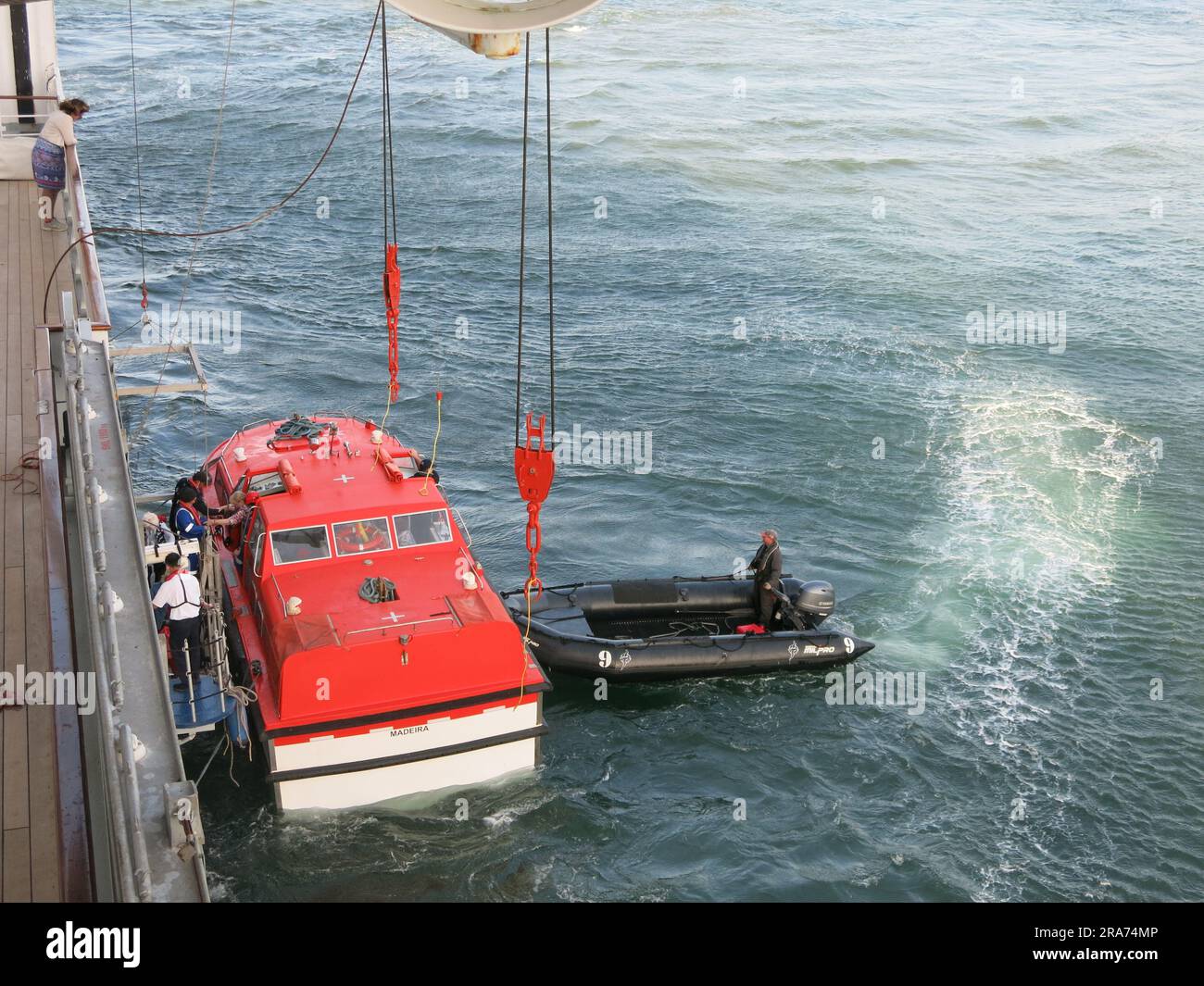 Lifeboat tender cruise ship passengers hi-res stock photography and ...