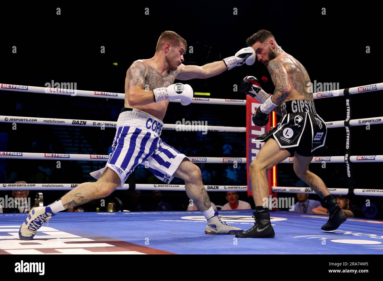 Adam Cope (left) and Lewis Sylvester in action during their English ...