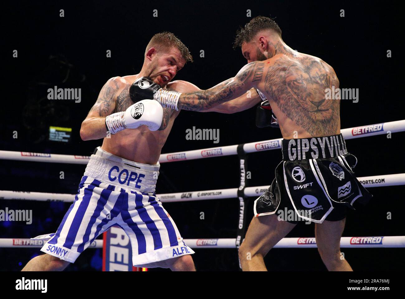 Adam Cope (left) and Lewis Sylvester in action during their English ...