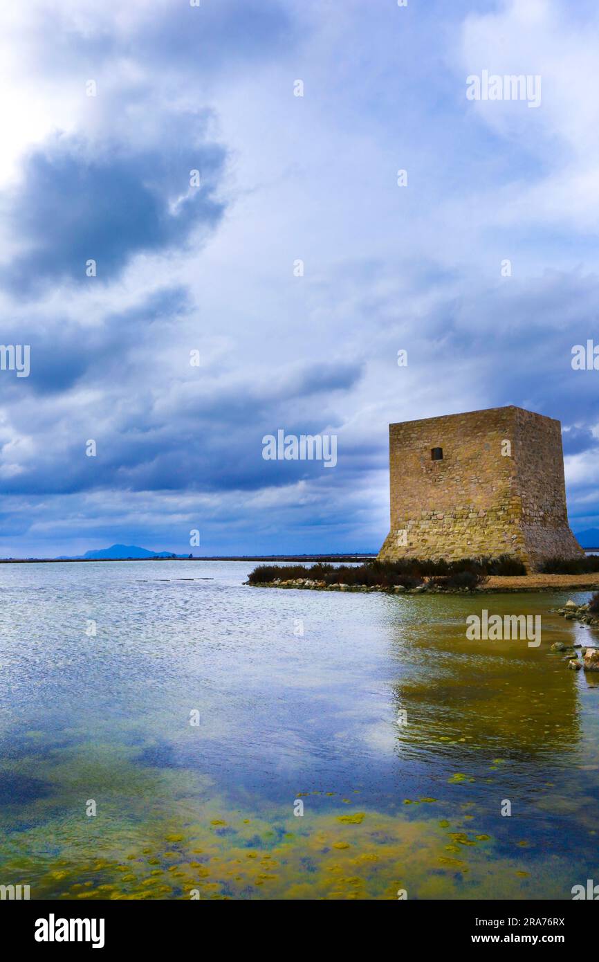 Beautiful Tamarit tower surrounded by salt lagoons in Santa Pola ...