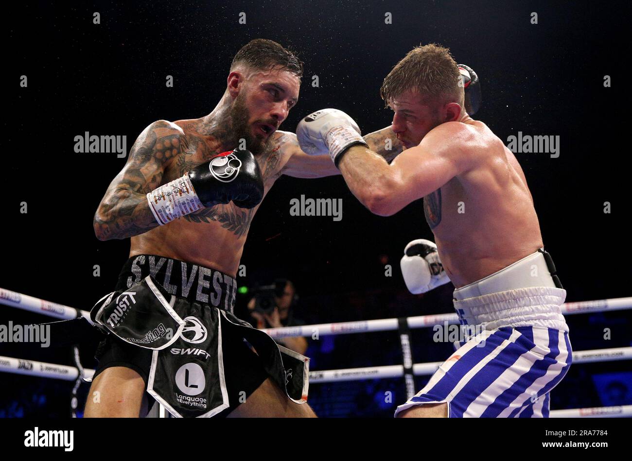 Lewis Sylvester (left) and Adam Cope in action during their English ...