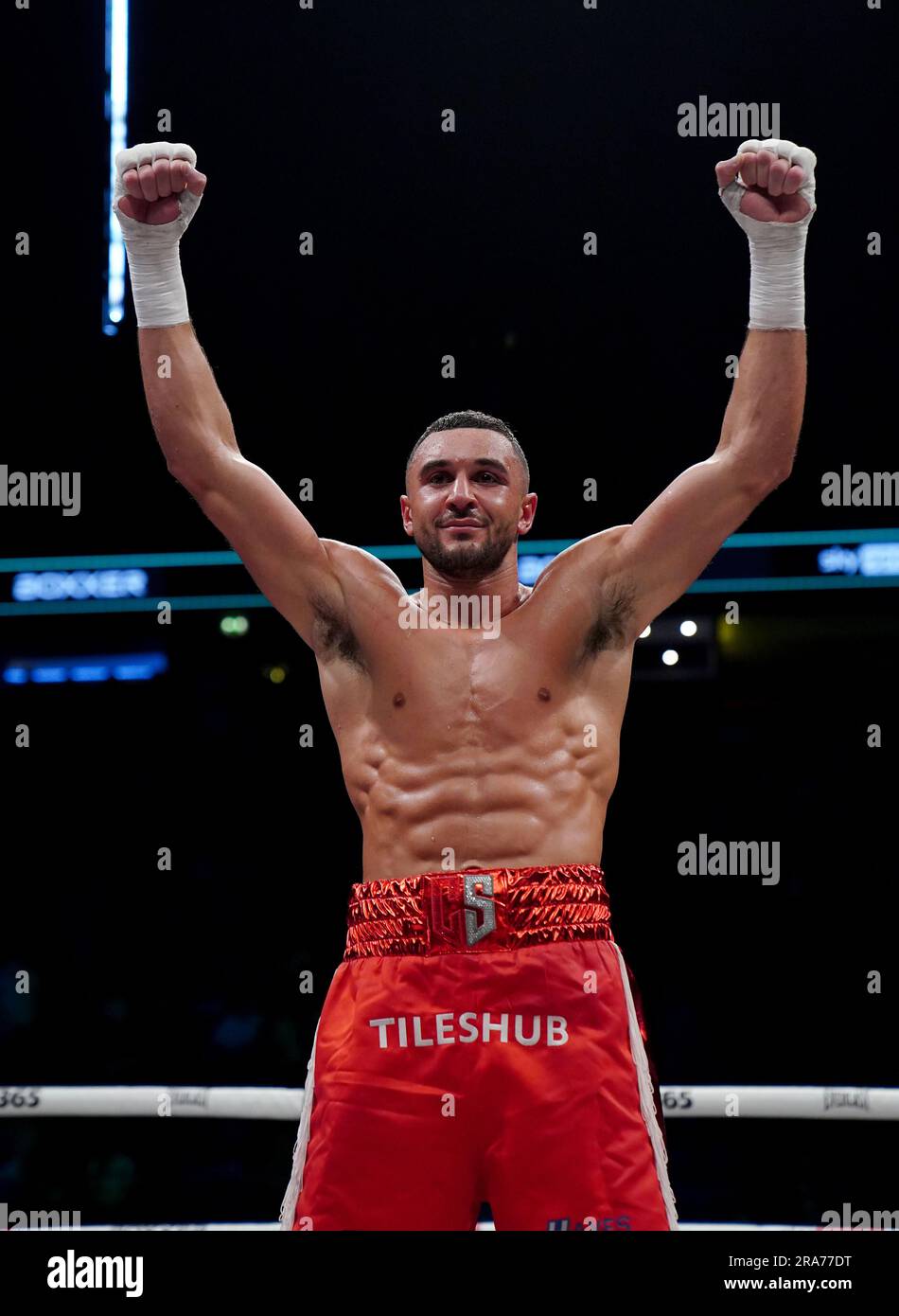 England's Callum Simpson is declared the winner following his super ...