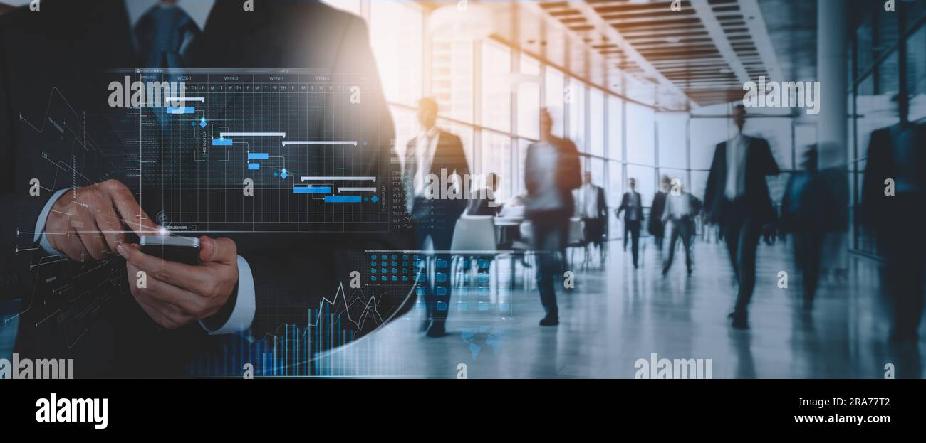 An analyst uses smartphone and dashboard for data business analysis and ...