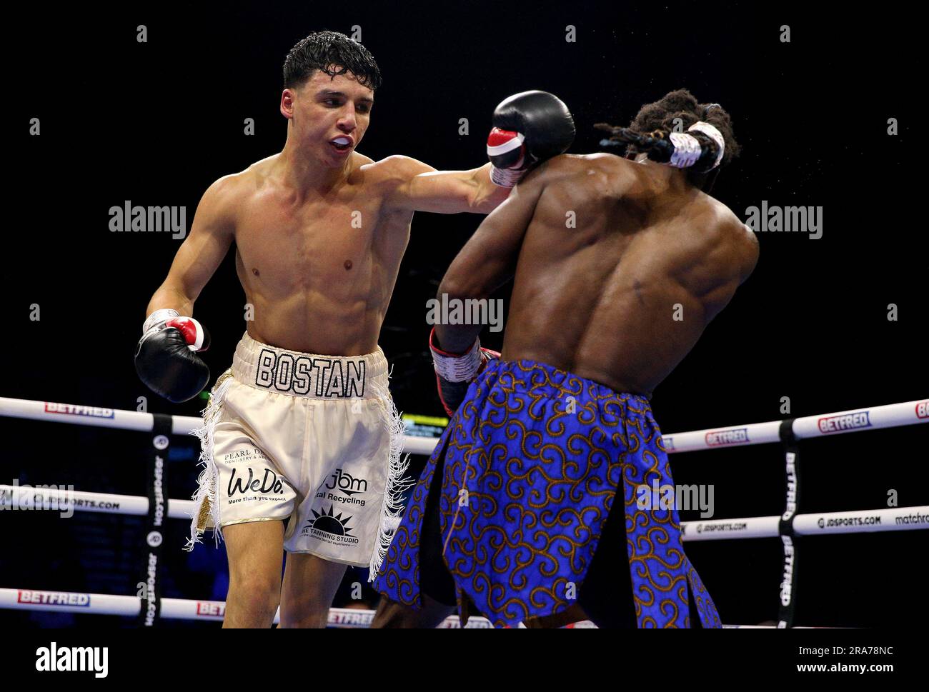 Junaid Bostan (left) and Ryan Amos in action during their Super ...