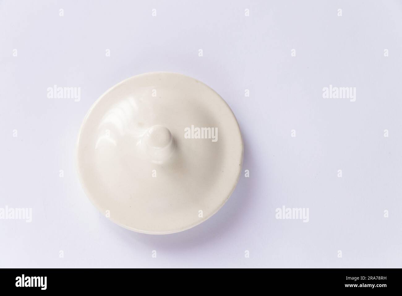 white glass lid on a white background Stock Photo - Alamy