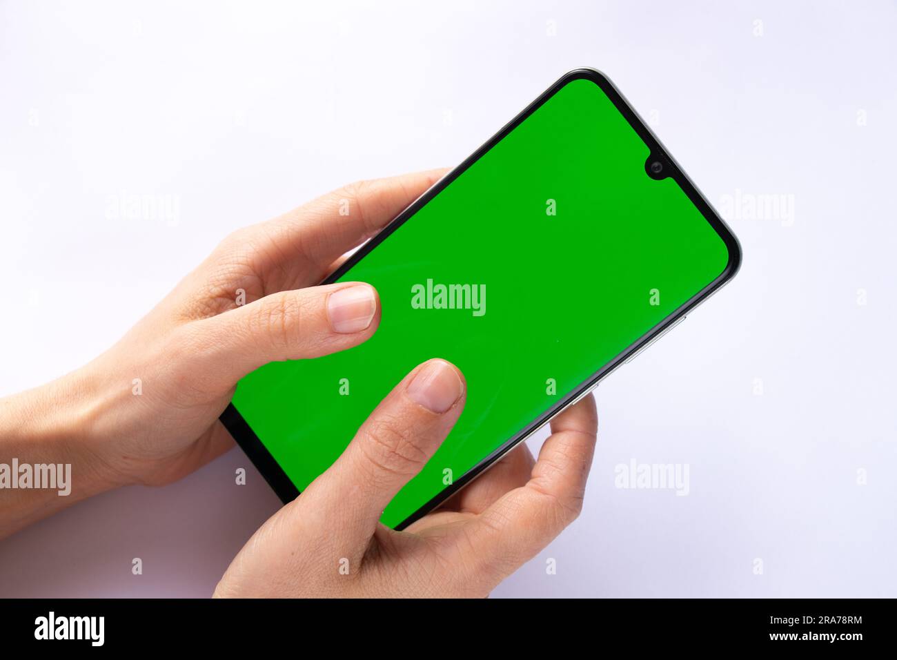 Mobile phone in right hand hi-res stock photography and images - Alamy