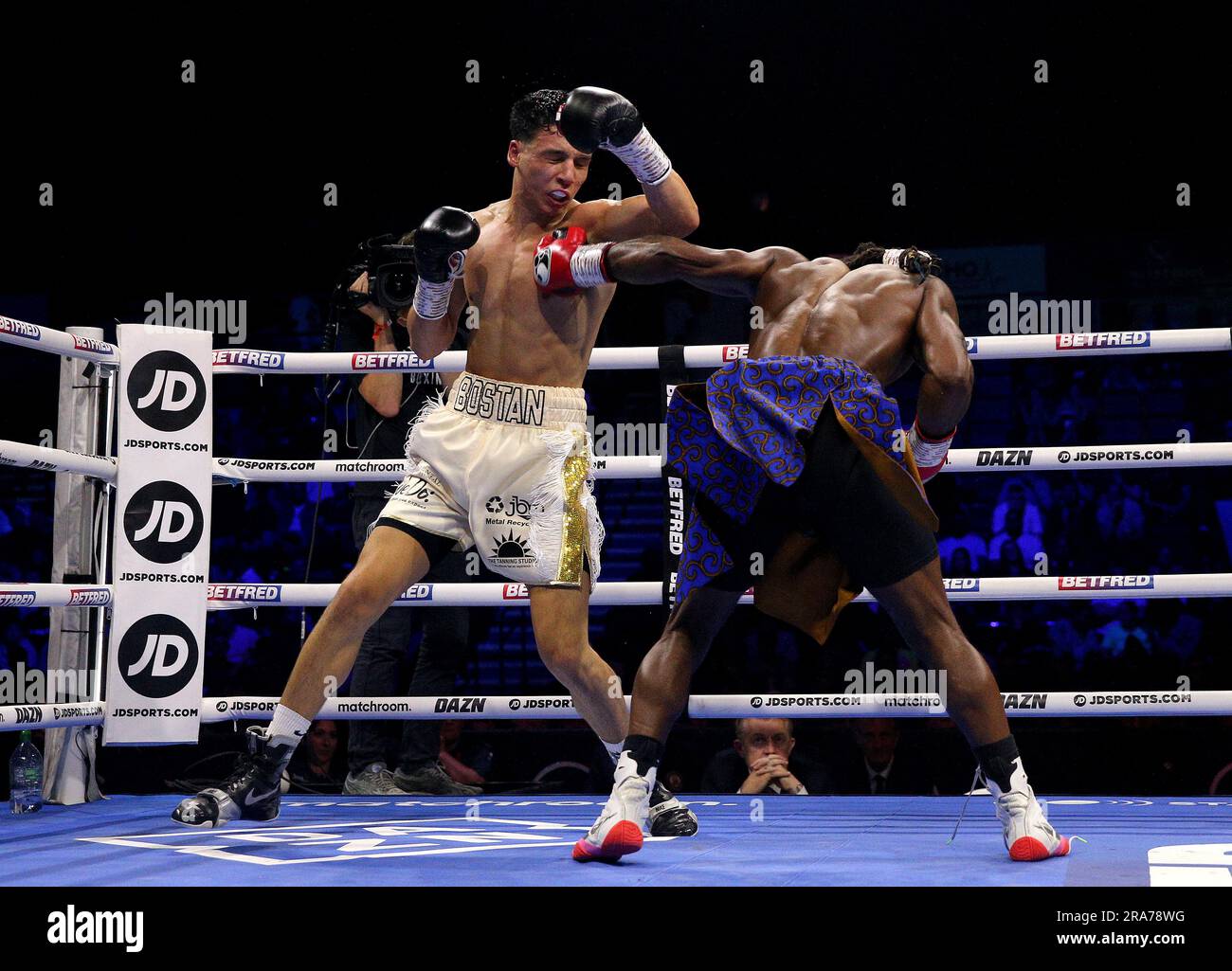 Junaid Bostan (left) and Ryan Amos in action during their Super ...