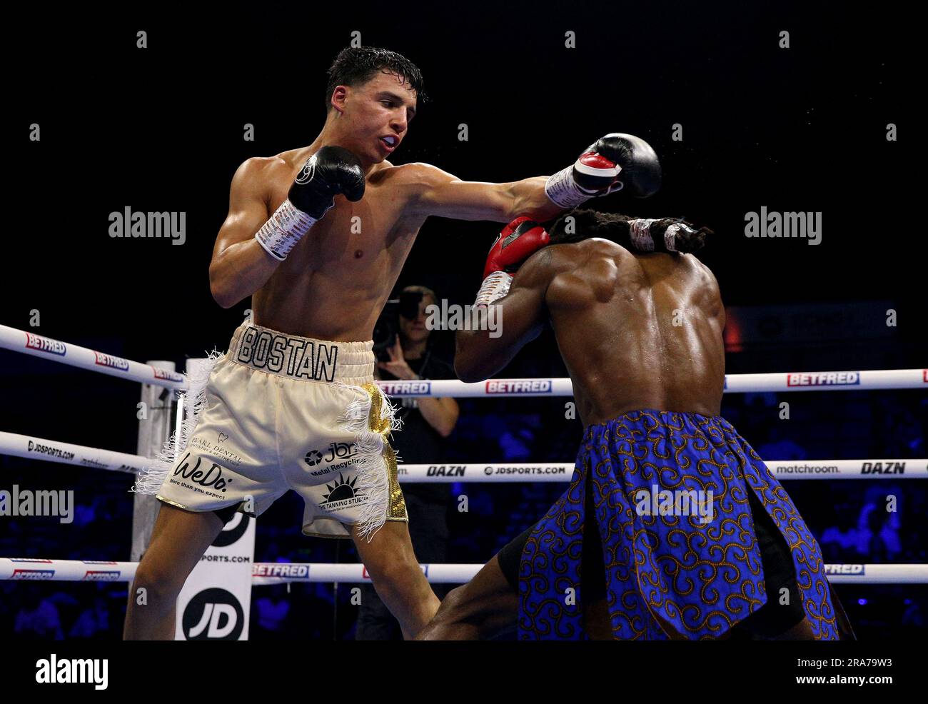 Junaid Bostan (left) and Ryan Amos in action during their Super ...