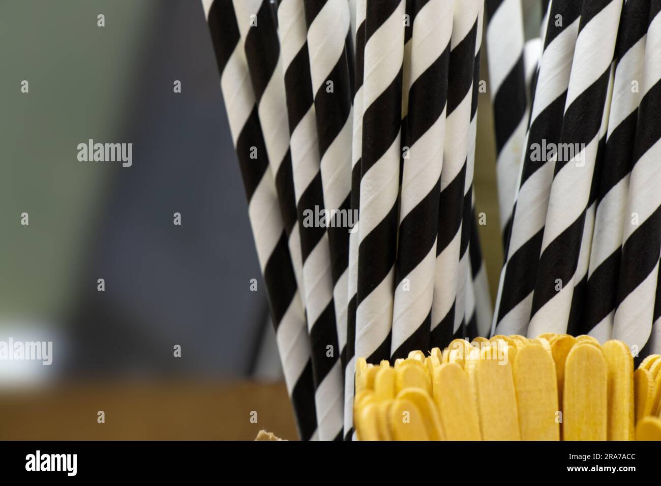 striped strips for cocktails in black and white stripes stands on the ...