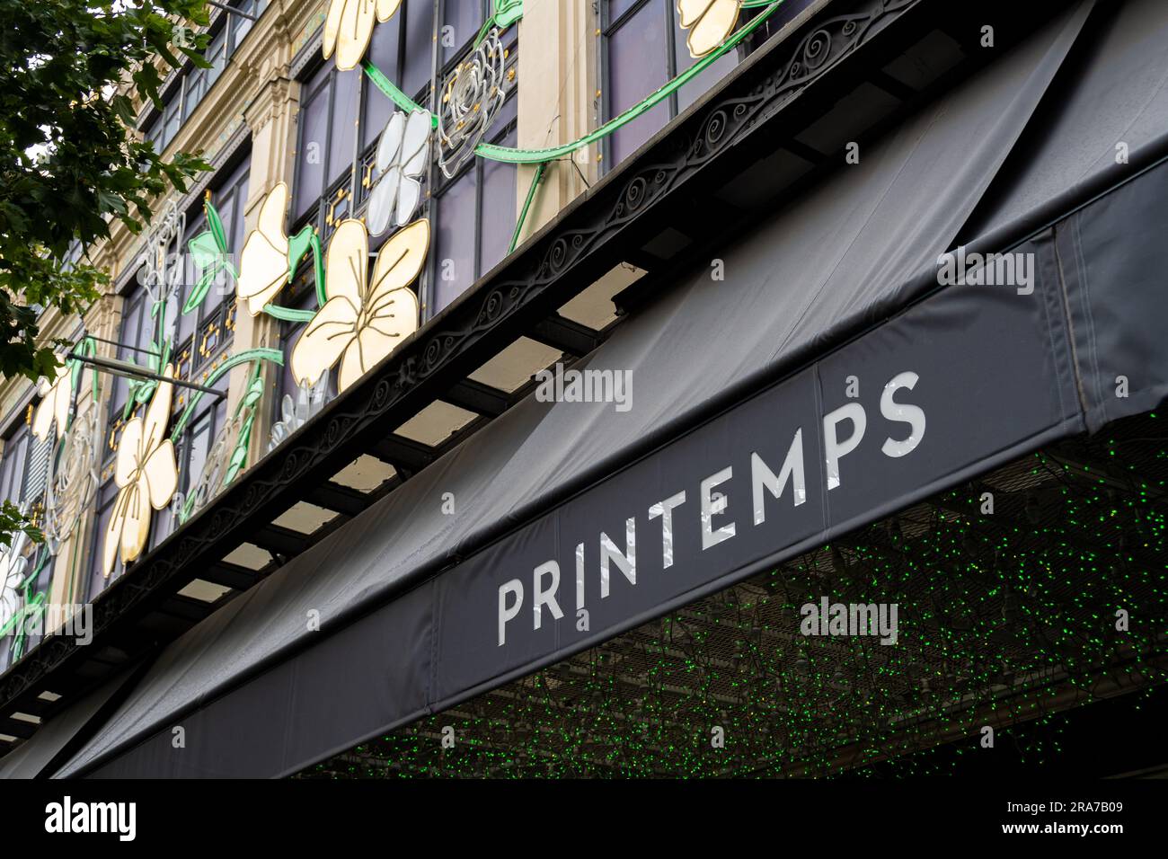 Close-up on the word 'Printemps' written on a black awning on the ...