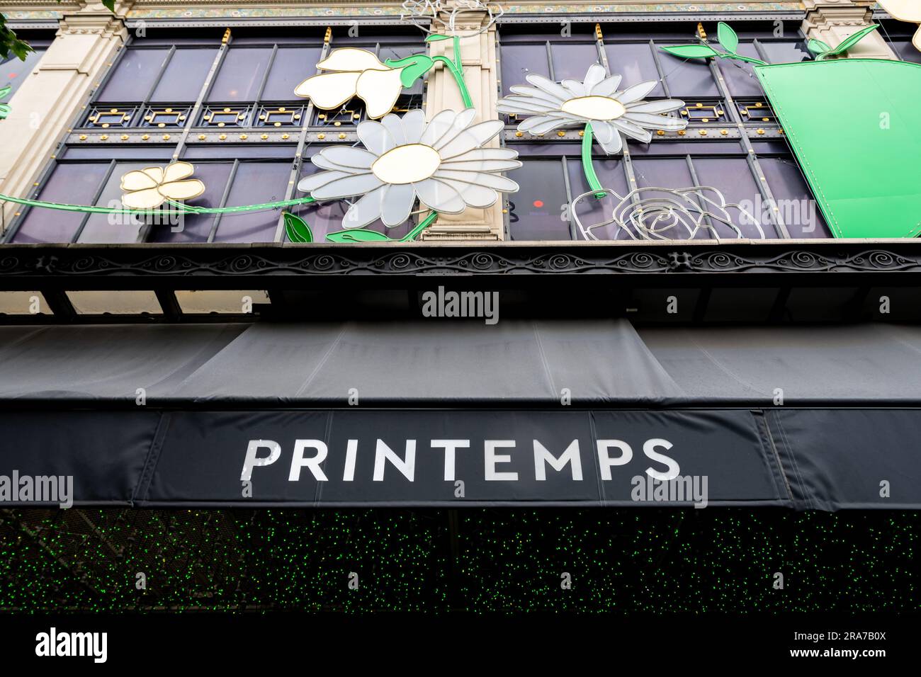 Close-up on the word 'Printemps' written on a black awning on the ...