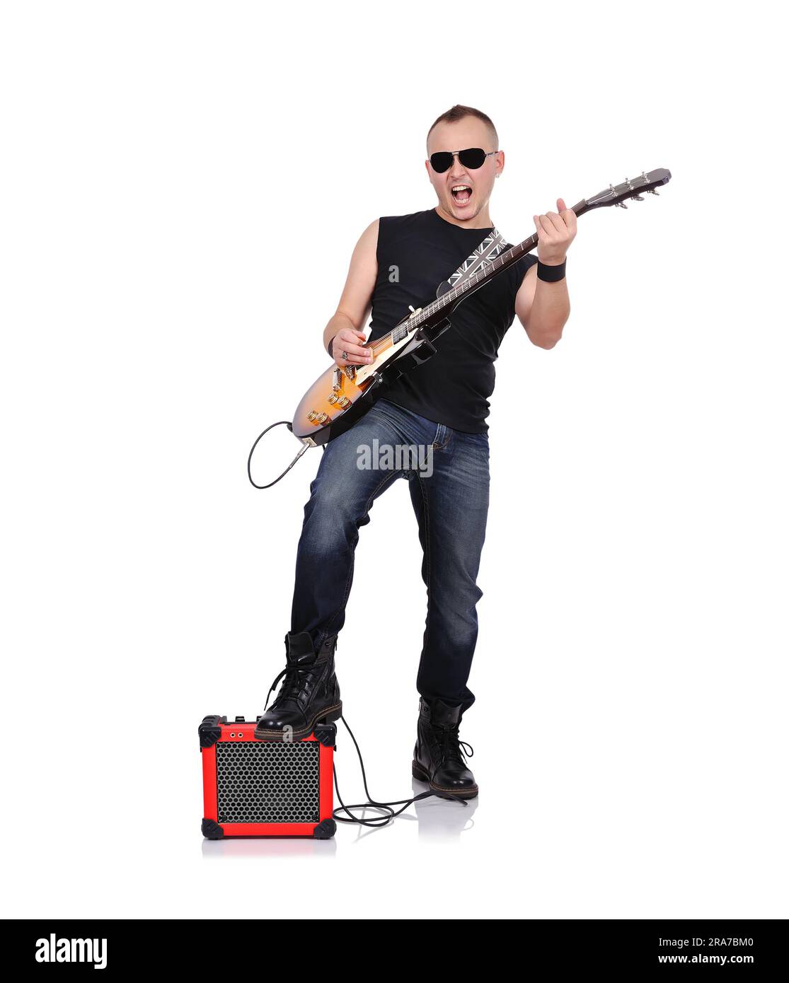 rocker with electrical guitar and guitar combo Stock Photo - Alamy