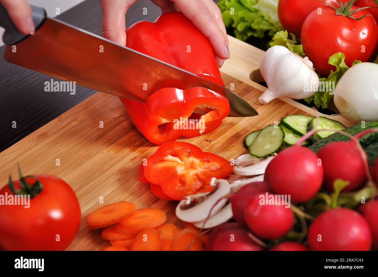 Hand knife cuts carrot hi-res stock photography and images - Alamy