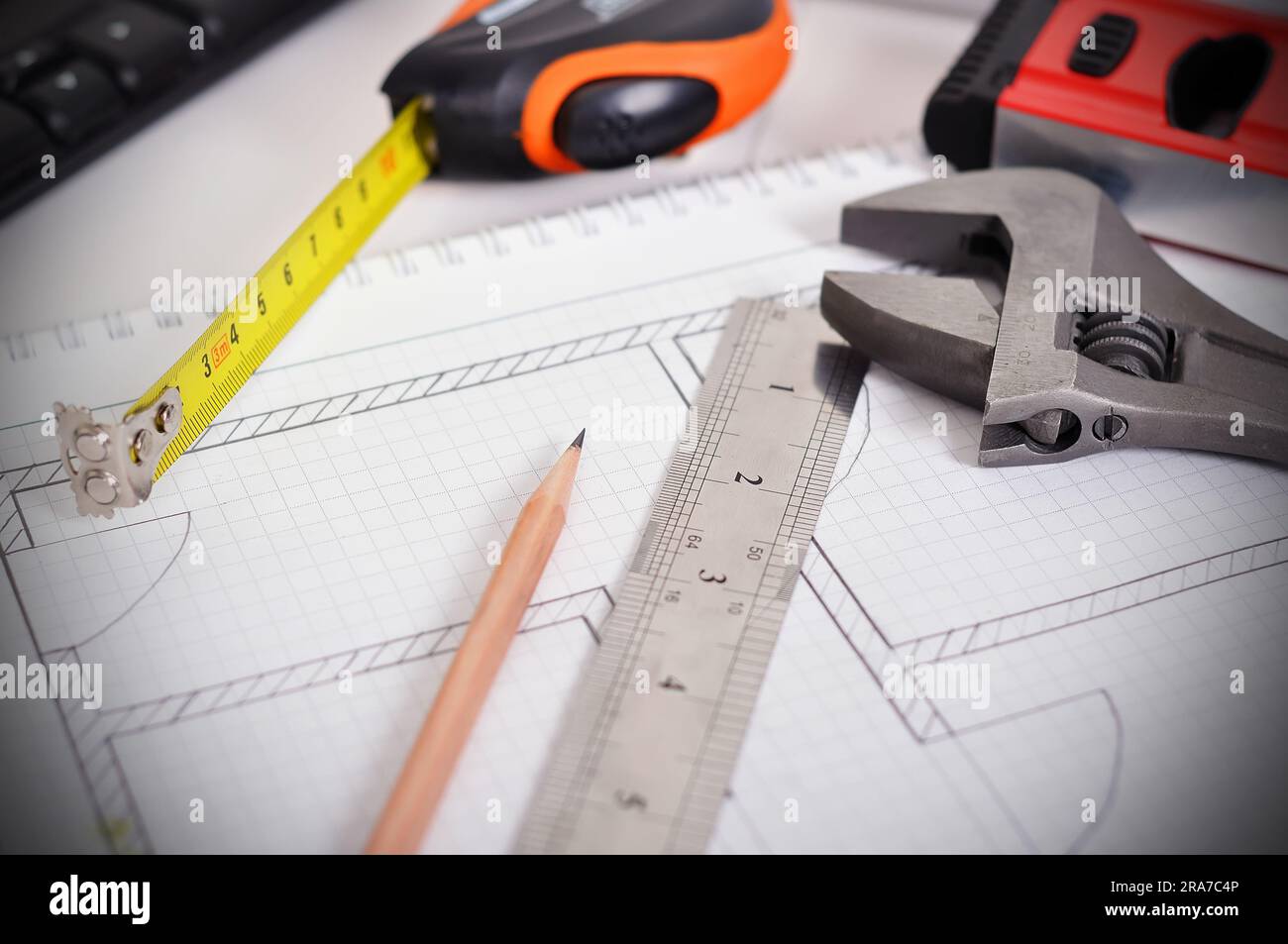 workspace engineer, tape line, line level and wrench Stock Photo - Alamy