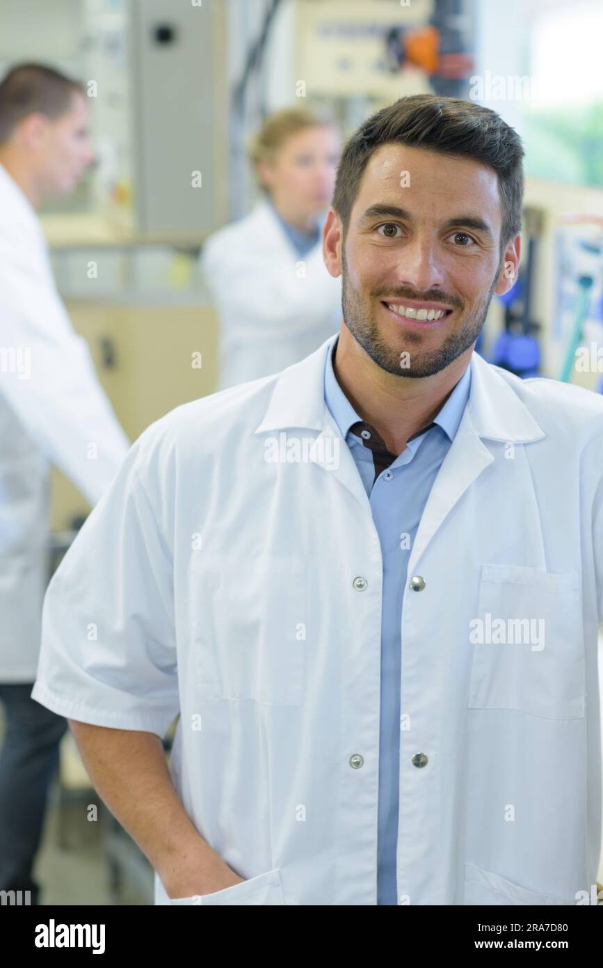 Male laboratory assistant wearing hi-res stock photography and images ...