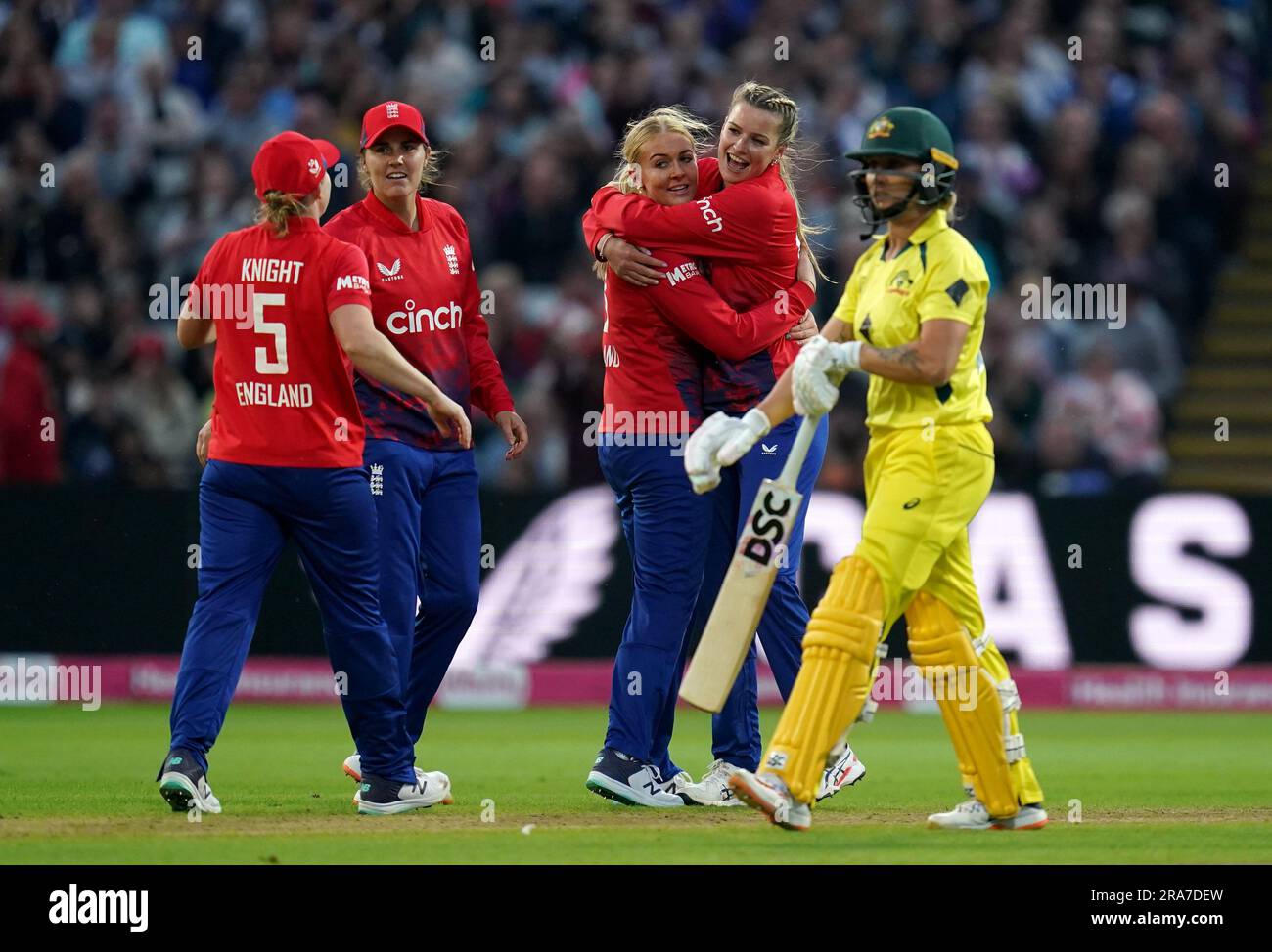 England's Sarah Glenn (centre) celebrates with Lauren Bell after taking ...