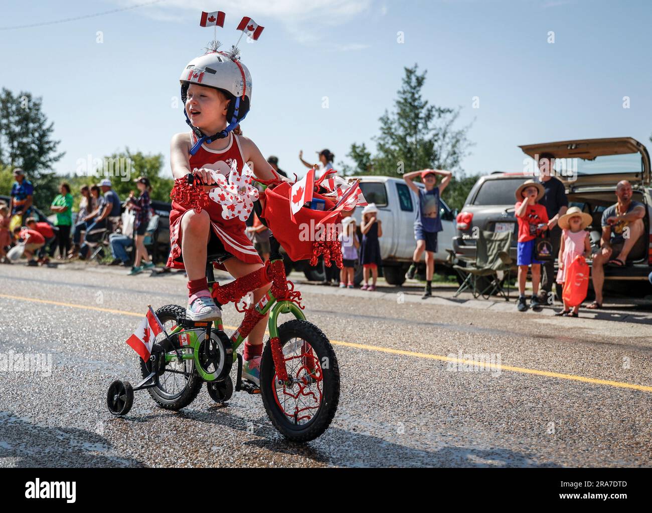 Cremona, Canada. 01st July, 2023. Emily Reid, four, rides her bike ...