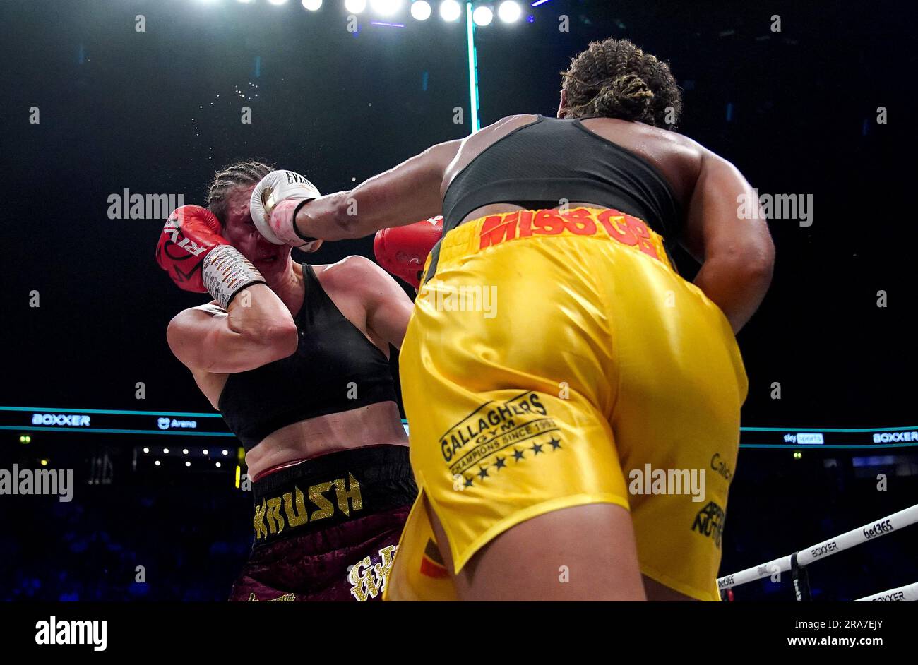 Kandi Wyatt (left) and Natasha Jonas in action during their IBF ...