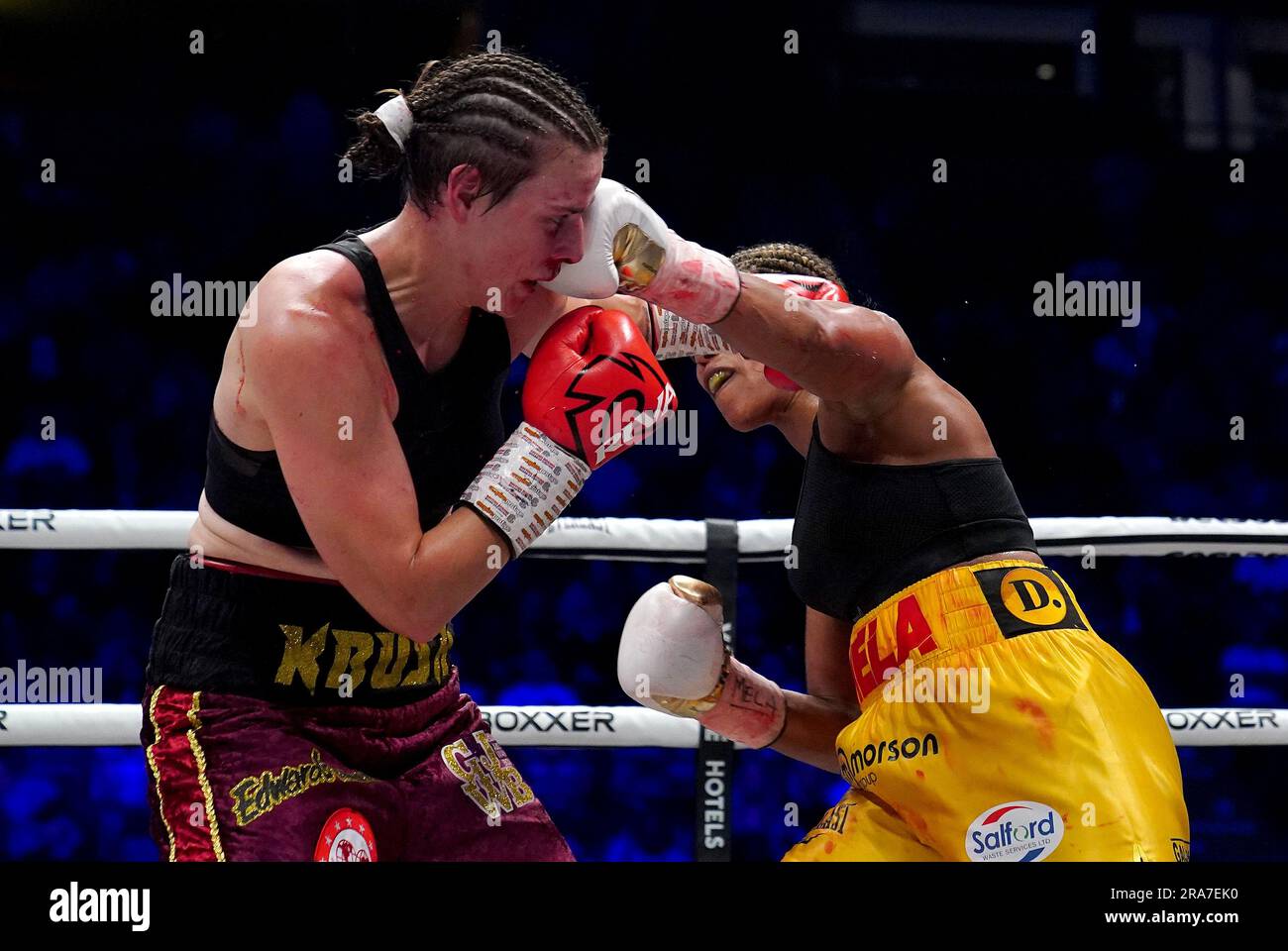 Kandi Wyatt (left) and Natasha Jonas in action during their IBF ...