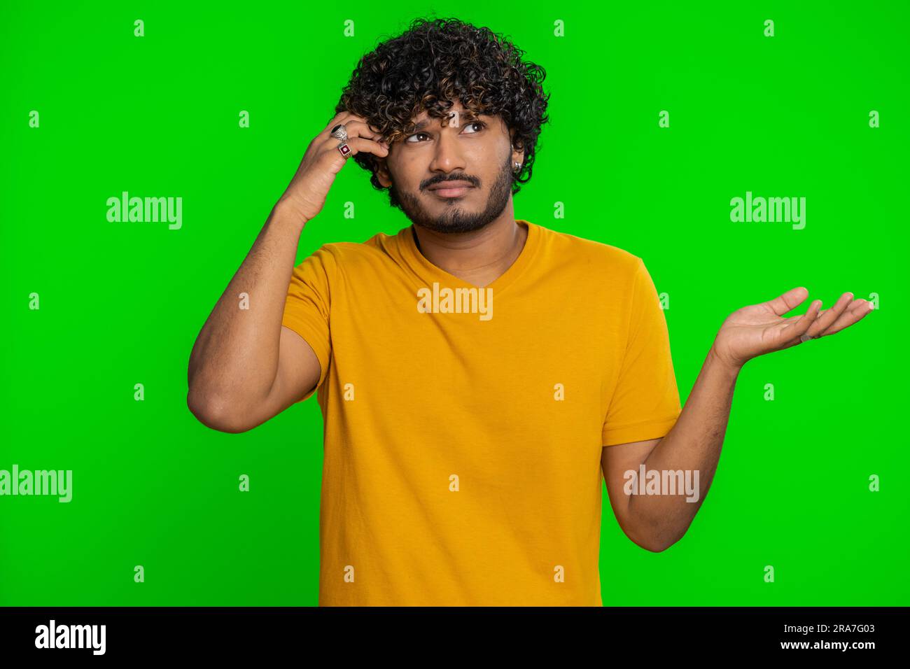 No idea, I dont know answer. Puzzled clueless uncertain indian handsome ...