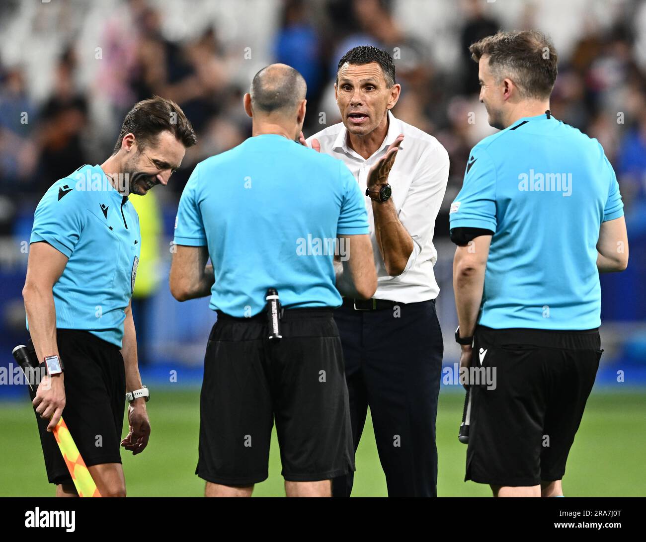 PARIS, FRANCE - JUNE 19: referee Mateu Lahoz and head coach Gus Poyet ...
